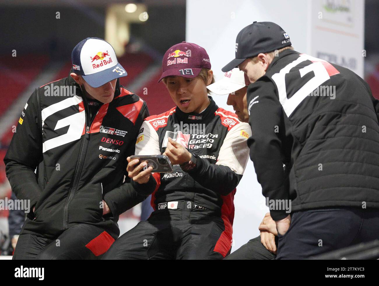Japanese rally driver Takamoto Katsuta (C) makes a race strategy plan ...