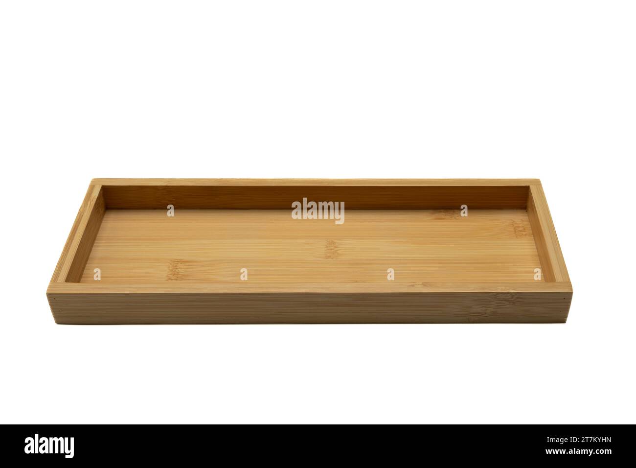 A close-up shot of a rectangular bamboo serving tray. Wooden tray with raised edges isolated on ...