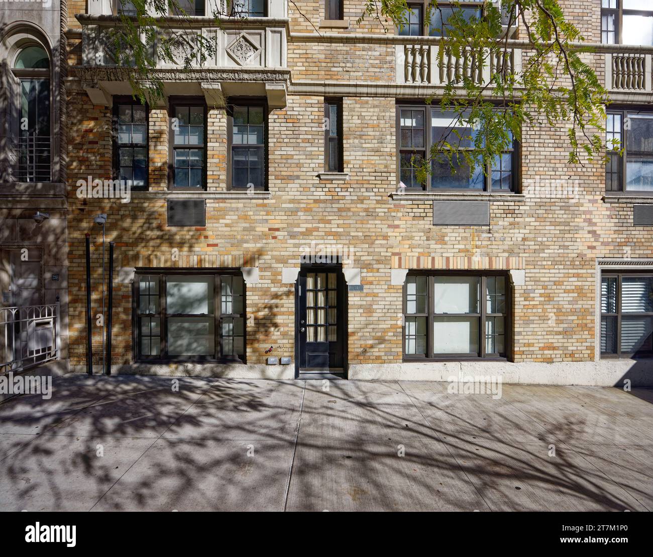 245 East 72nd Street, a brick and stone apartment building designed by ...