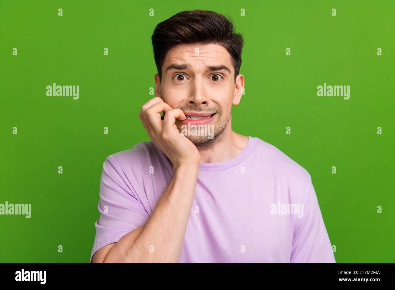 Portrait of terrified nervous person with stylish haircut wear violet t ...