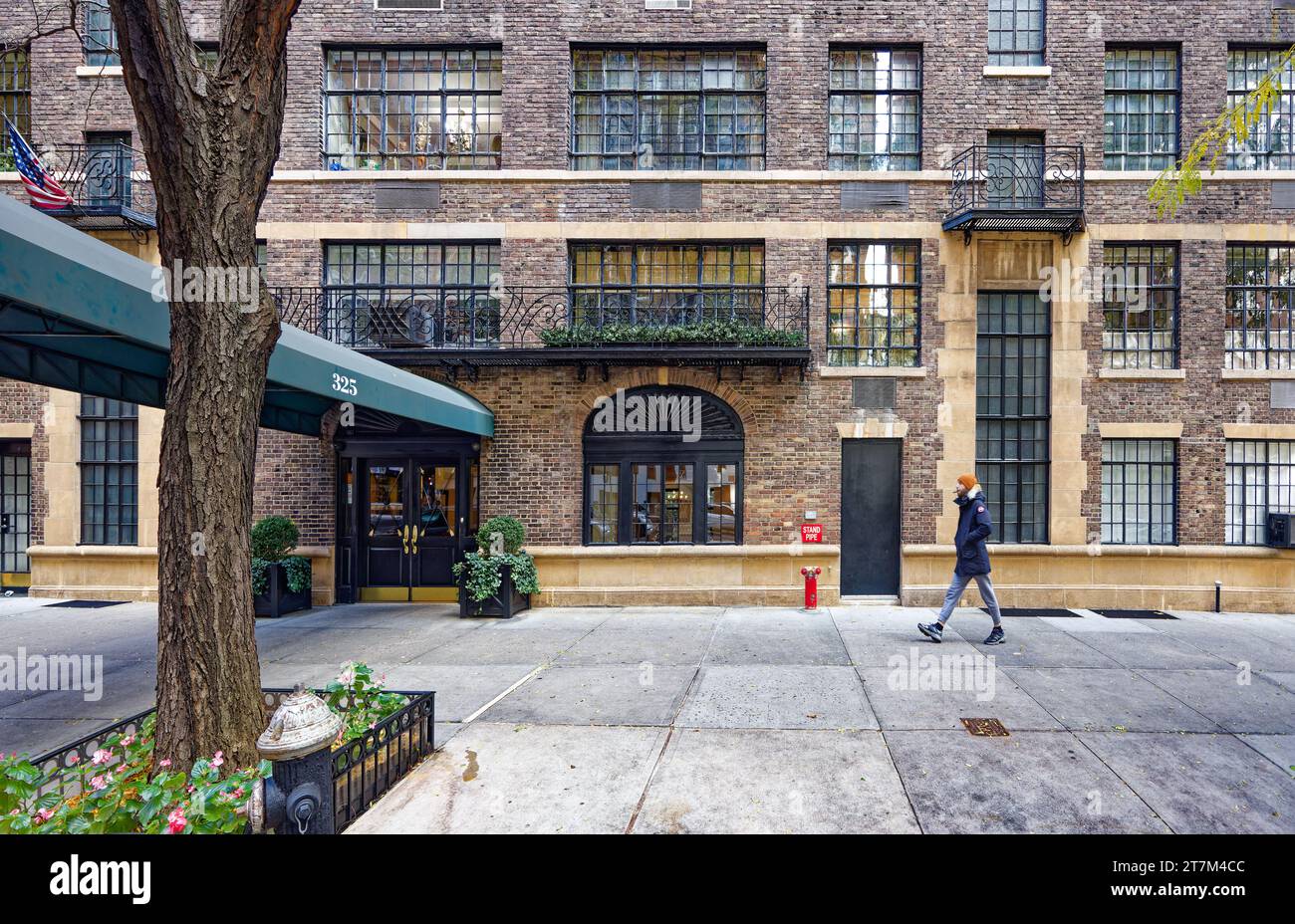 325 East 72nd Street, a brick and stone apartment building designed by ...