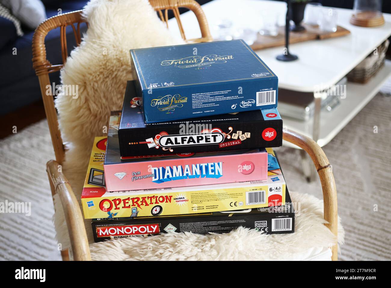 Board games (In swedish: sällskapsspel), in a swedish home Stock Photo ...