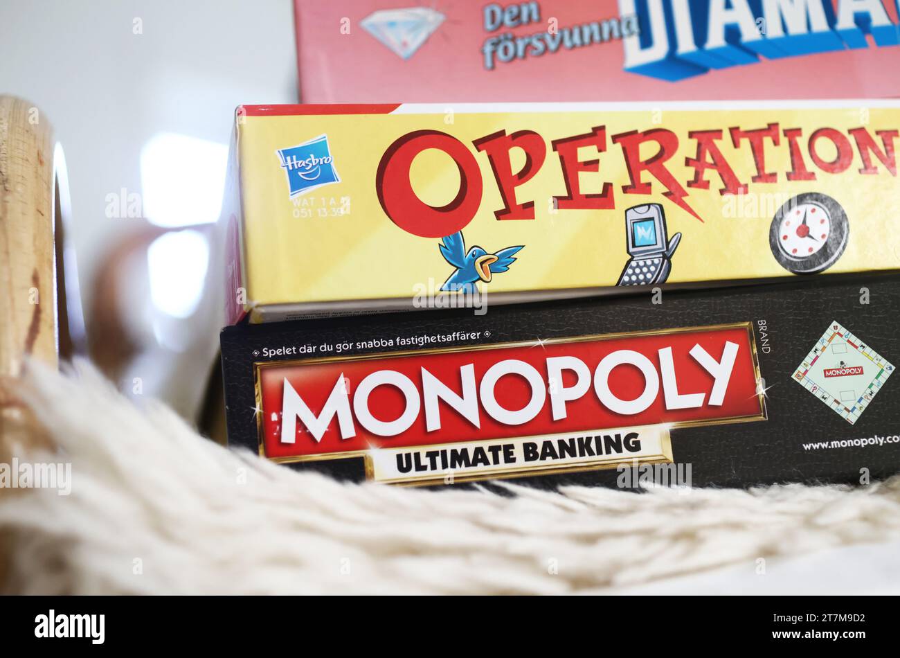 Board games (In swedish: sällskapsspel), in a swedish home Stock Photo ...