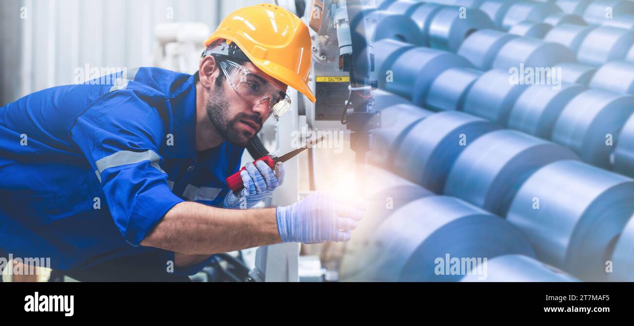 Engineers mechanic using computer controller Robotic arm for welding ...