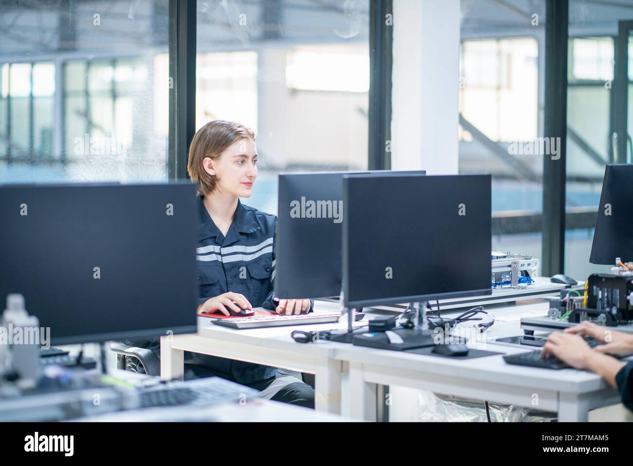 Mechanical engineering team working in robotic technology lap for research and develop for ...