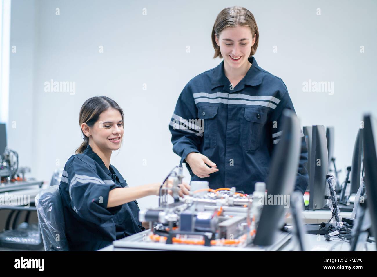 Mechanical engineering team working in robotic technology lap for ...