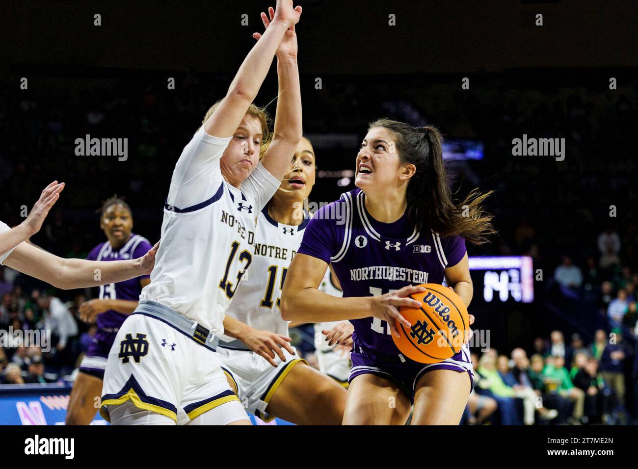 South Bend, Indiana, USA. 15th Nov, 2023. Northwestern guard Casey Harter (12) drives to the ...