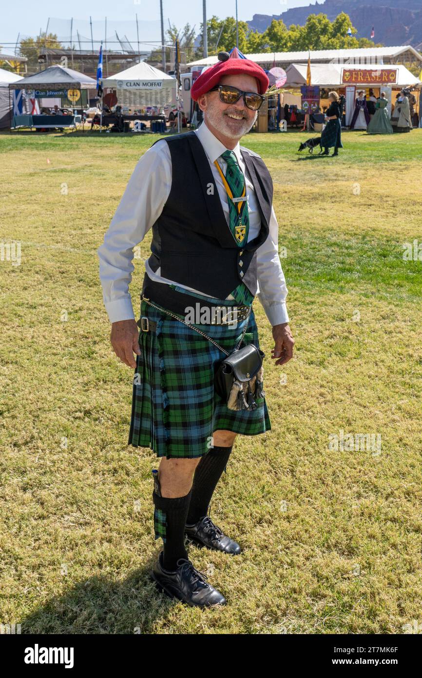A participant in the traditional Scottish kilt of Clan Campbell at the ...
