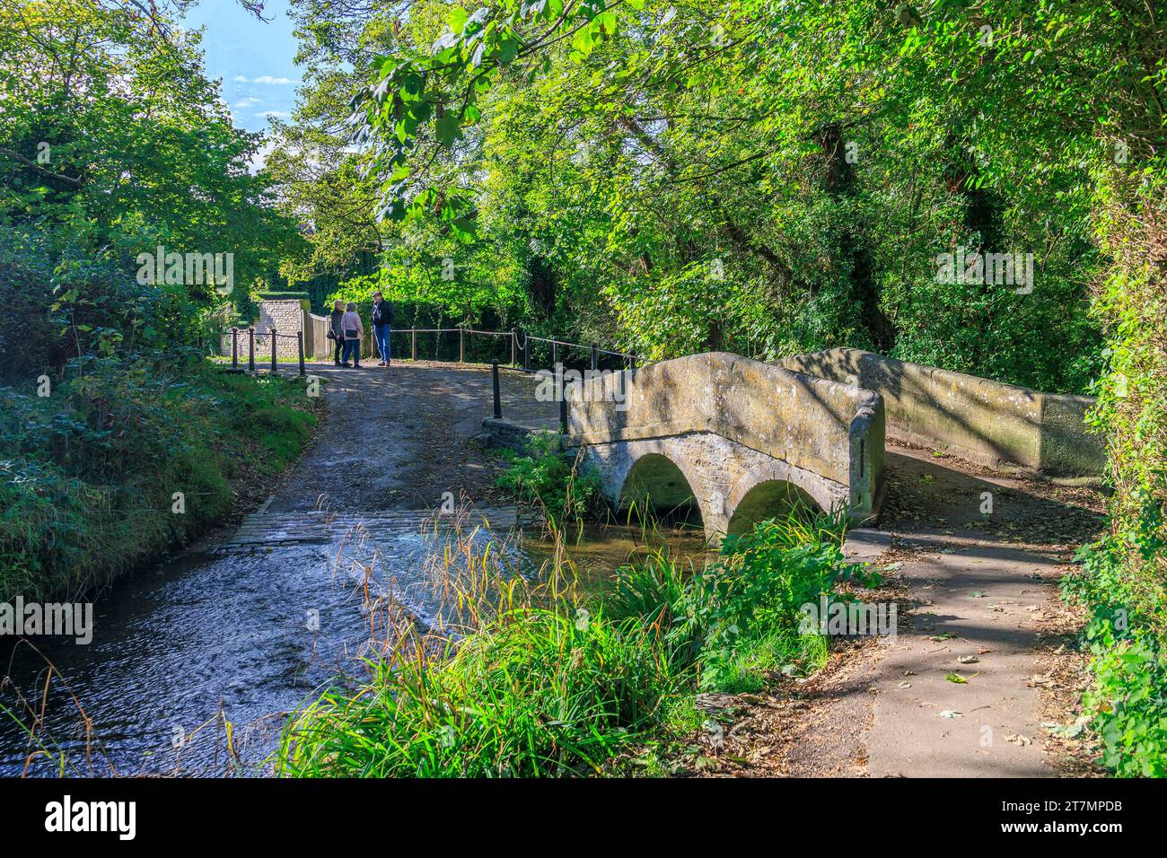 The Bide Brook ford and footbridge on Nethercote Hill in Lacock village ...