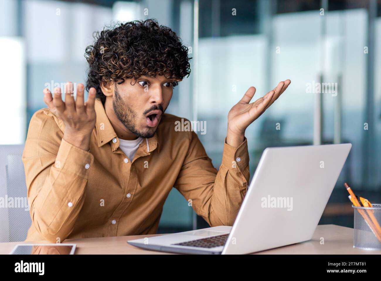 Dissatisfied man received notification online, businessman reading ...