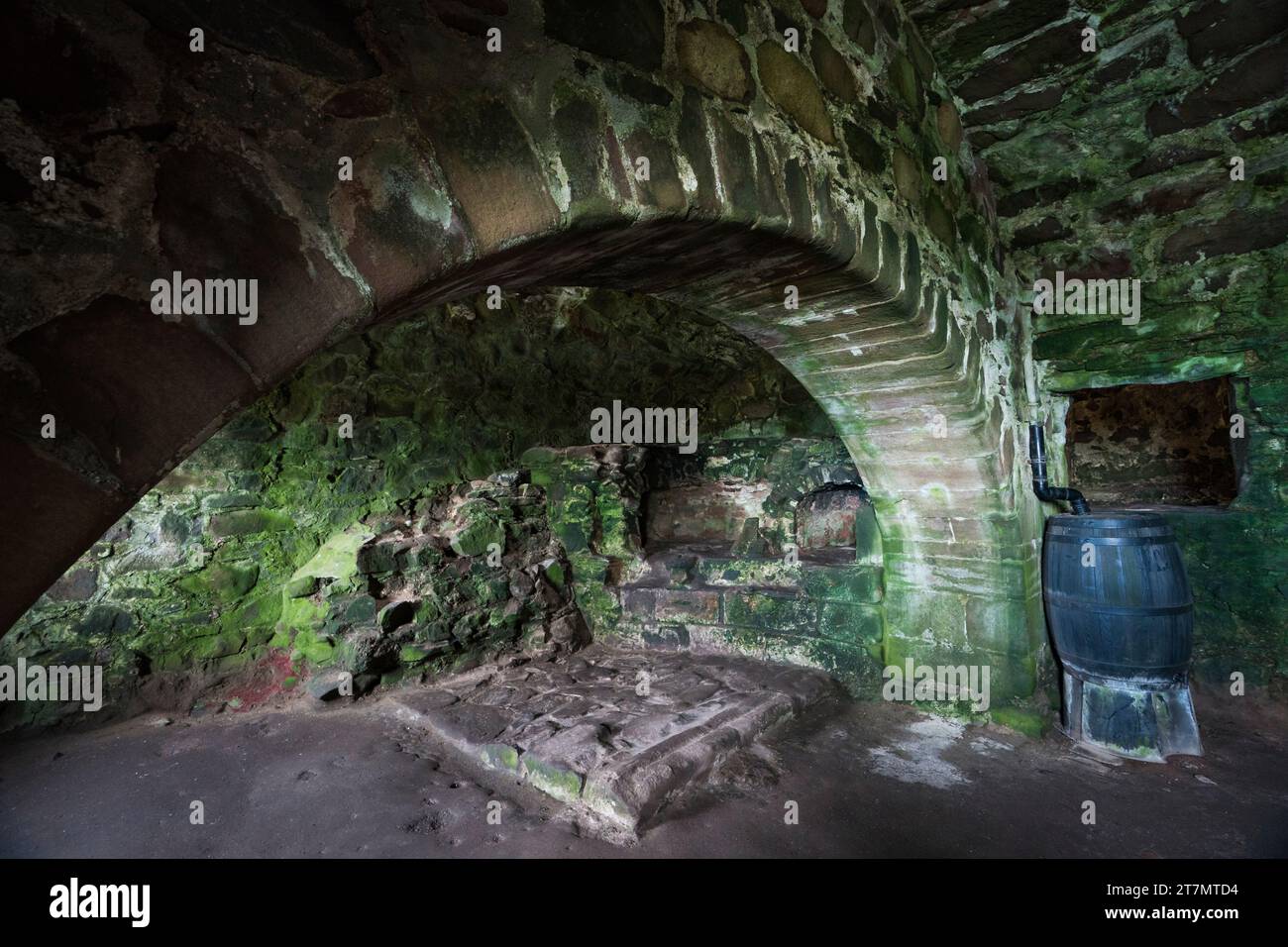 Old mossy kitchen in the stone ruined castle of Dunnottar, Stonehaven ...