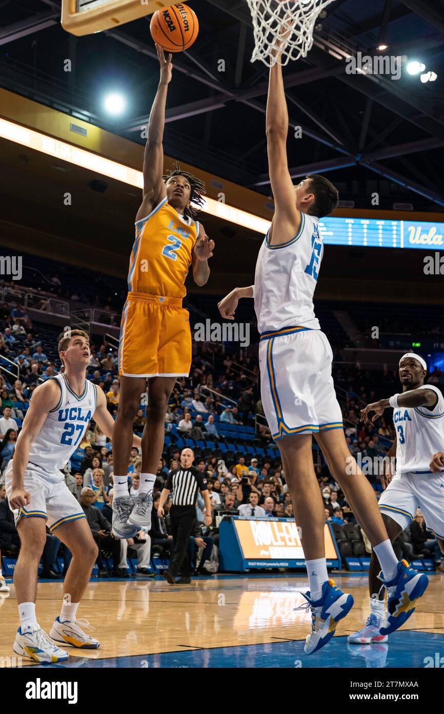 LIU Sharks guard Eric Acker (2) shoots over UCLA Bruins center Aday ...