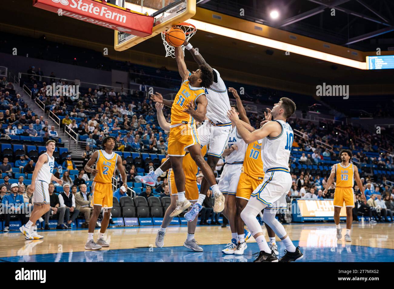 LIU Sharks guard Terell Strickland (11) wins a rebound against UCLA ...