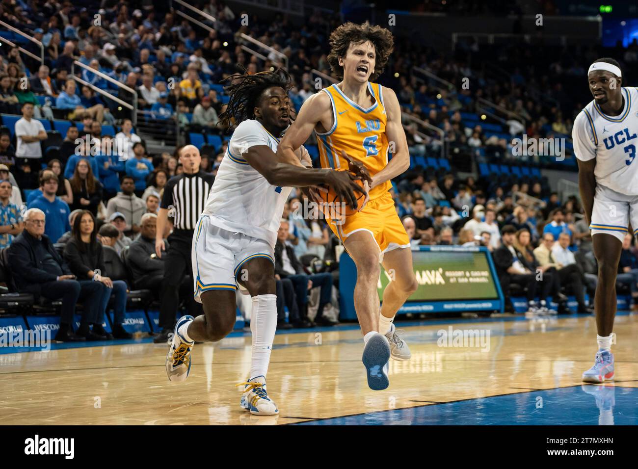UCLA Bruins guard Will McClendon (4) steals the ball against LIU Sharks ...