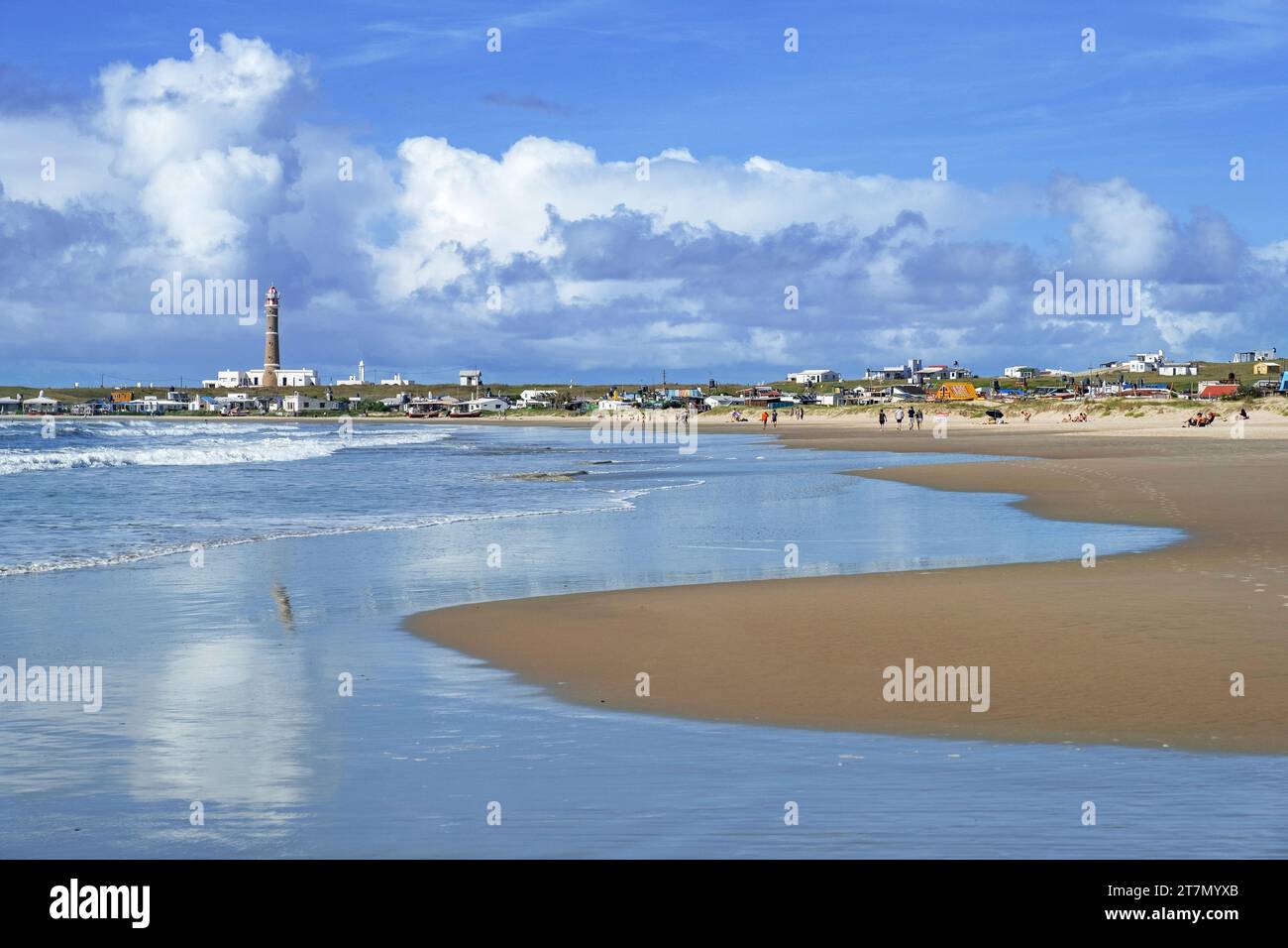Sandy beach, lighthouse and hamlet Cabo Polonio along the Atlantic ...