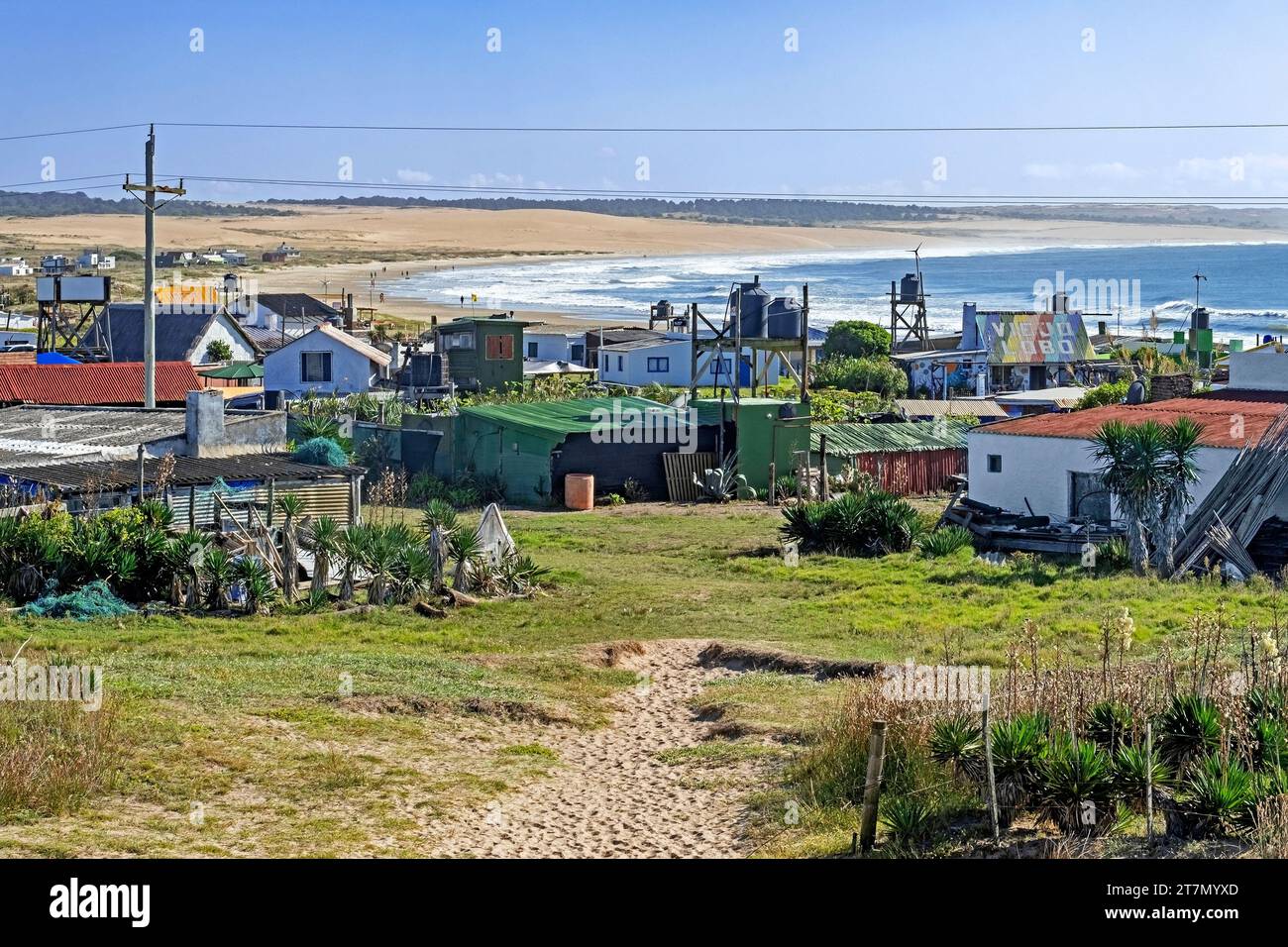 Colourful houses in the hamlet Cabo Polonio along the Atlantic Ocean ...