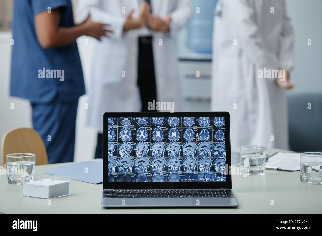 Background image of X ray images on computer screen on table in medical ...