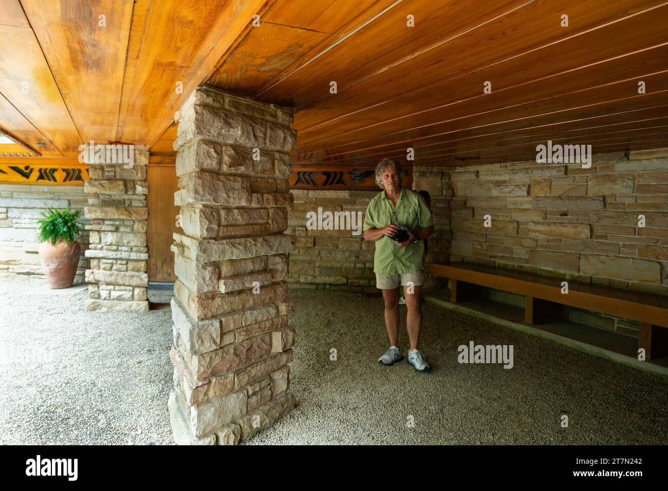 Man stands in garage carport of the Kentuck Knob, Usonian styled ...