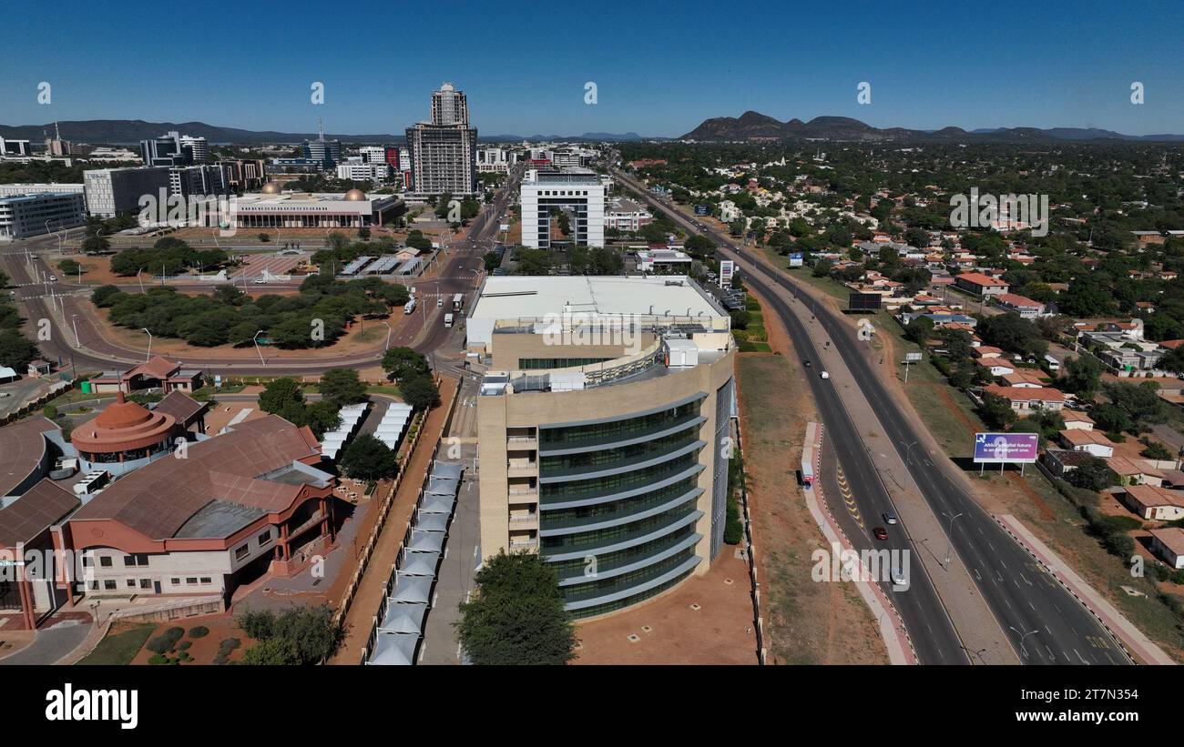 A bustling metropolitan area with a skyline of towering skyscrapers ...