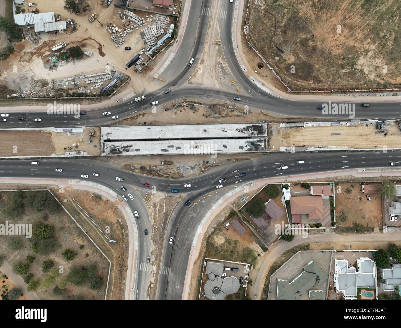 Aerial view of a busy intersection with multiple lanes of traffic ...