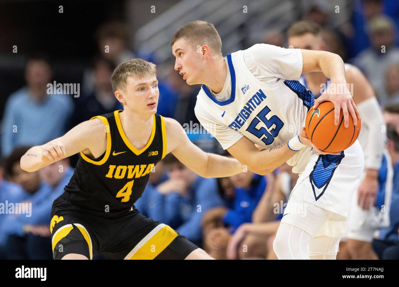 Creighton's Baylor Scheierman (55) plays against Iowa's Josh Dix (4 ...