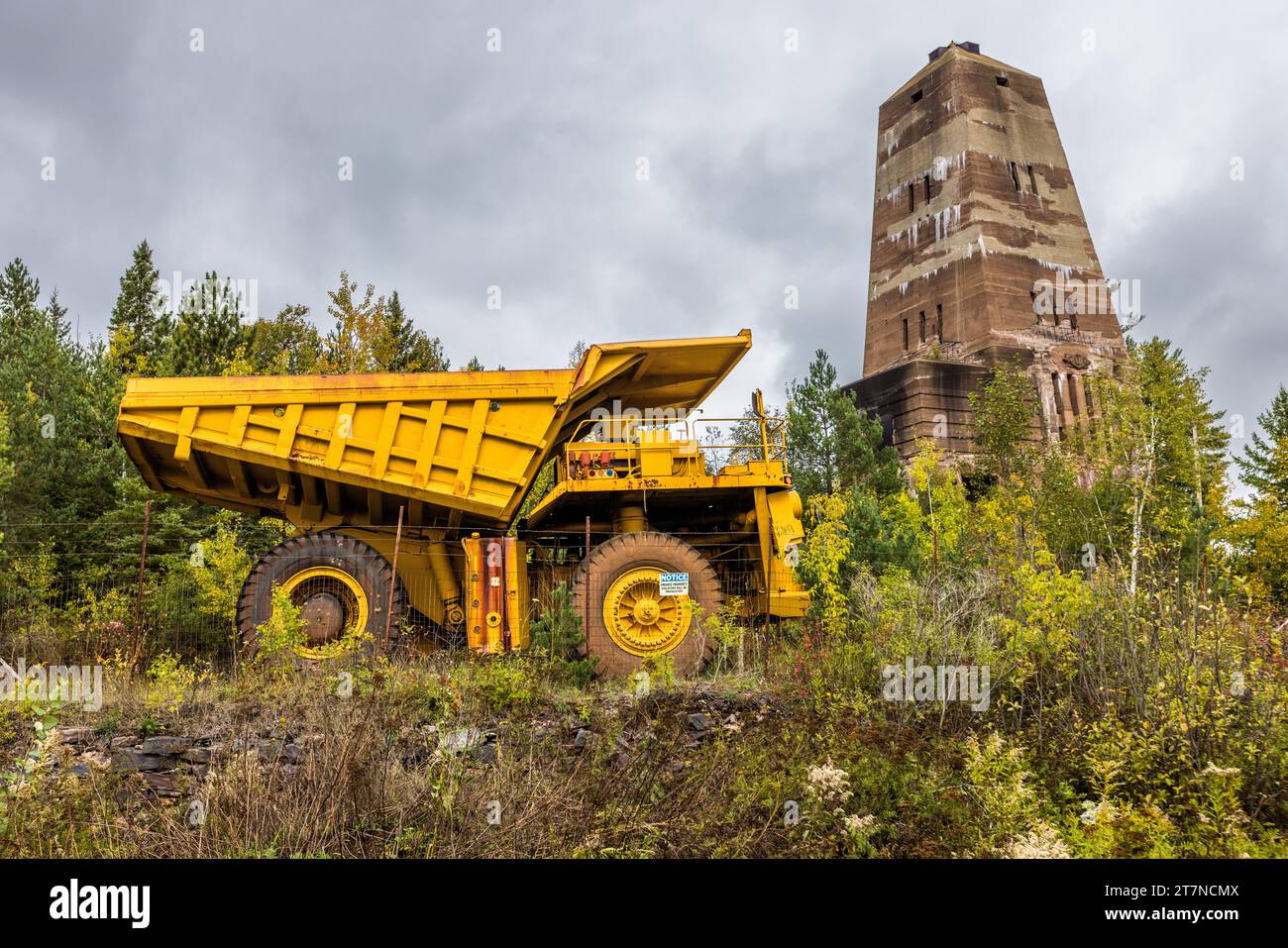 Only the tires of the ore transporter on display in front of the ...