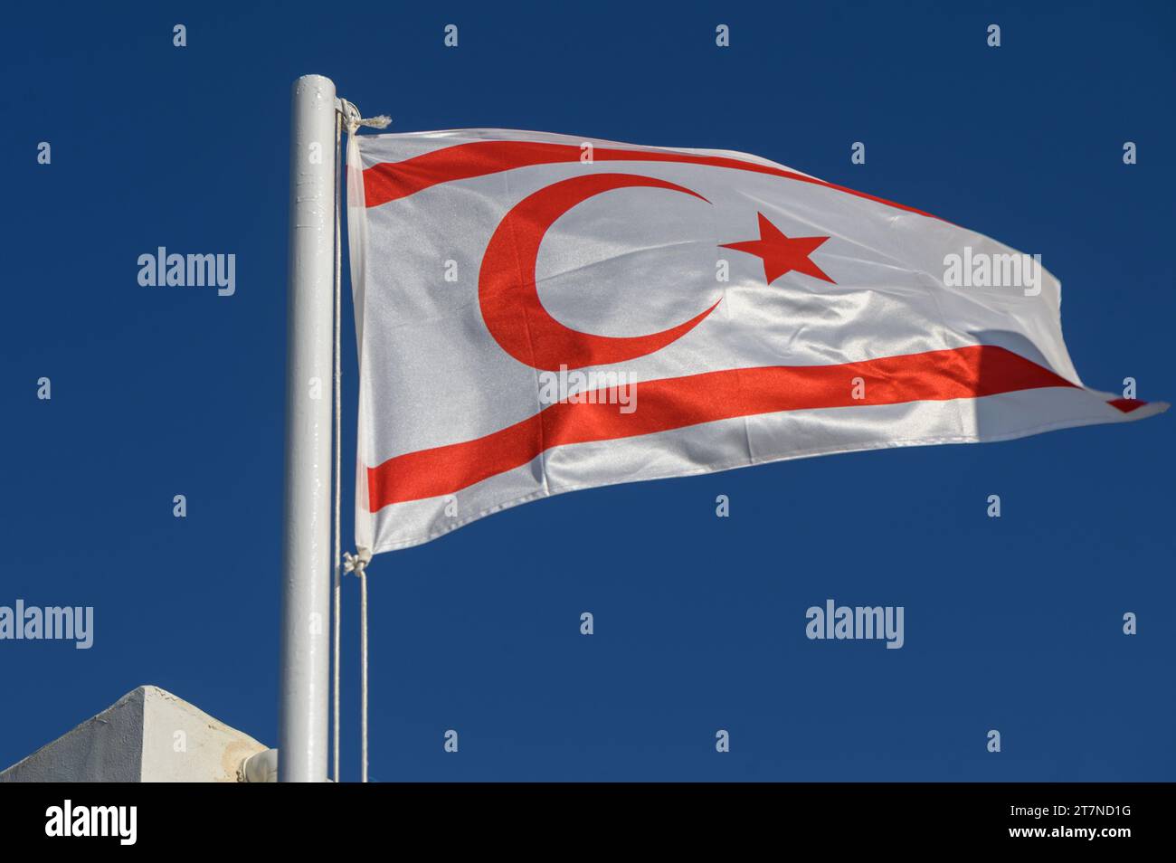 Northern Cyprus flag against blue sky 1 Stock Photo - Alamy