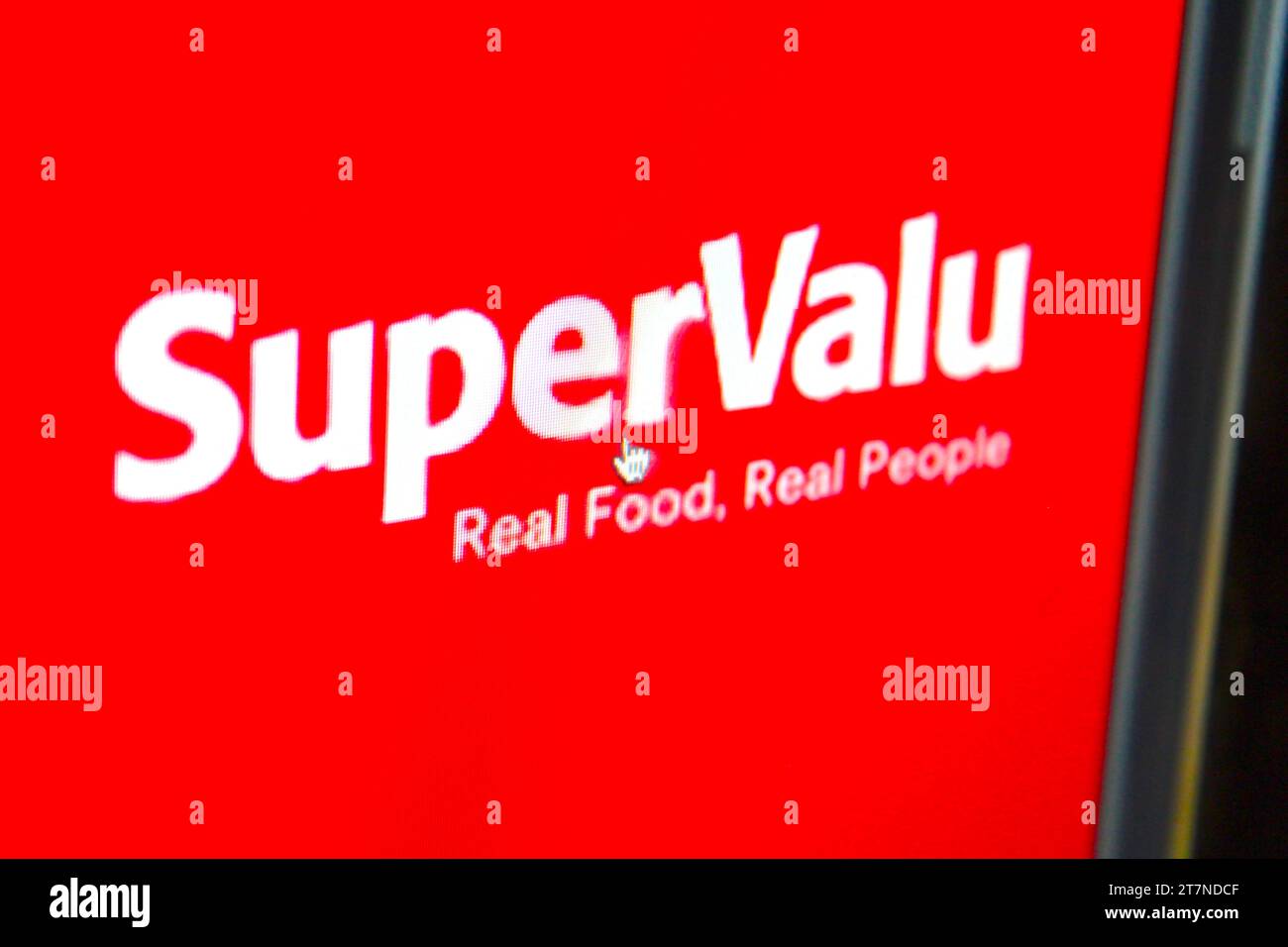 A photo of the red and white Supervalu logo on a computer screen Stock Photo - Alamy