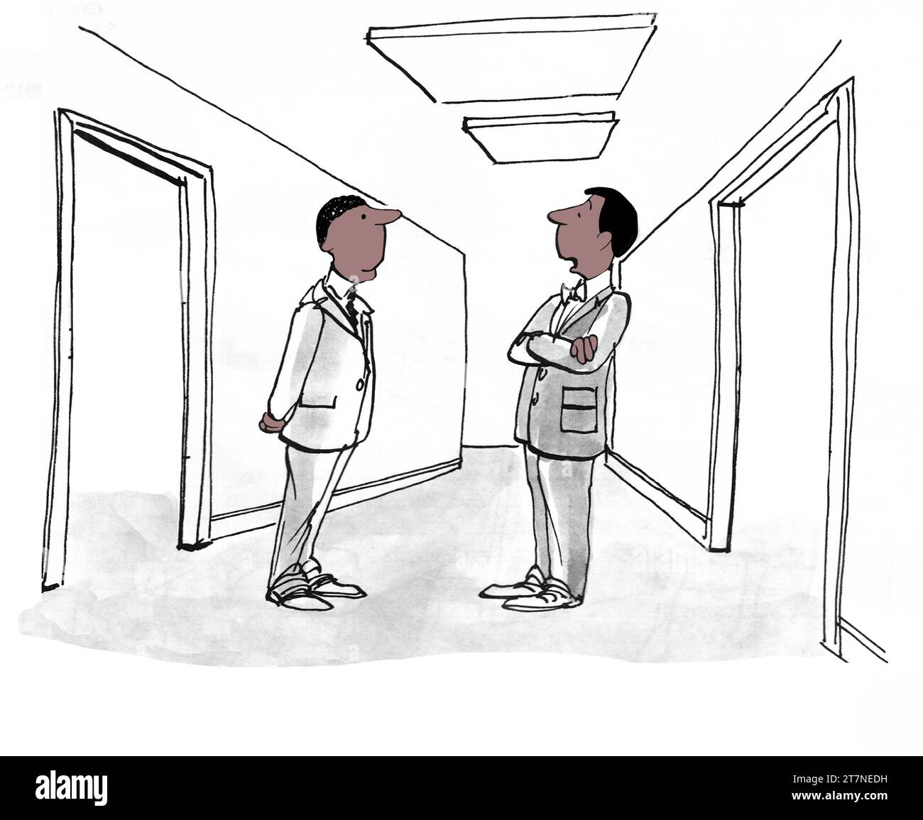 Two African American male professionals are having a hallway, quick ...