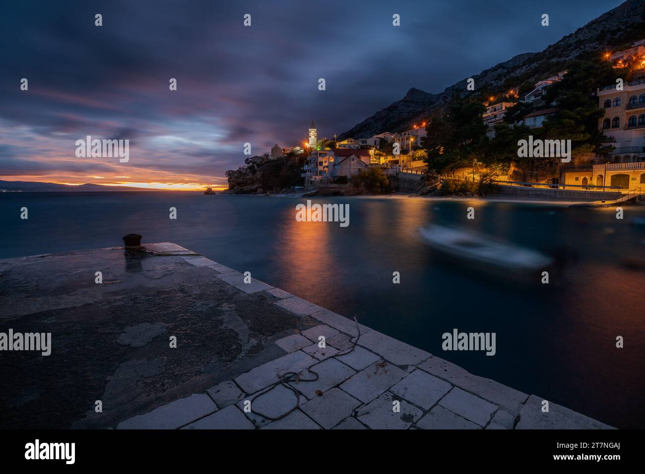 Romantic landscape of a small marina on the Makarska Riviera during a ...
