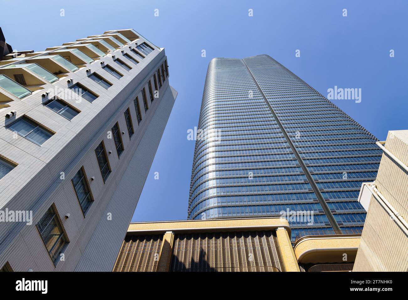 Tokyo, Japan - April 10, 2023: low angle view of Azabudai Hills Mori JP ...