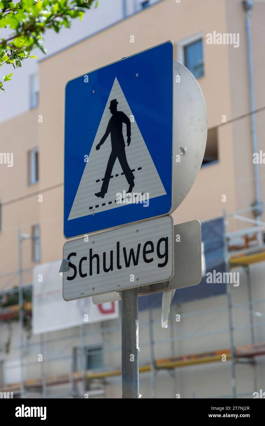 Road sign "Pedestrian crossing" with the inscription in German "Way to ...