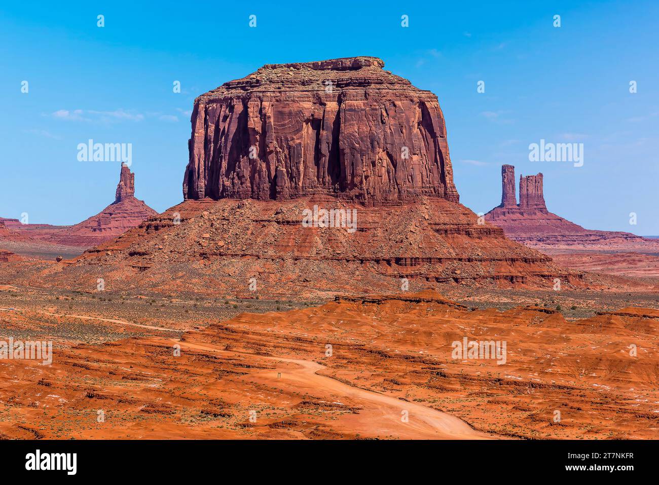 A dominant view of Merrick Butte with East Mitten and West Mitten ...