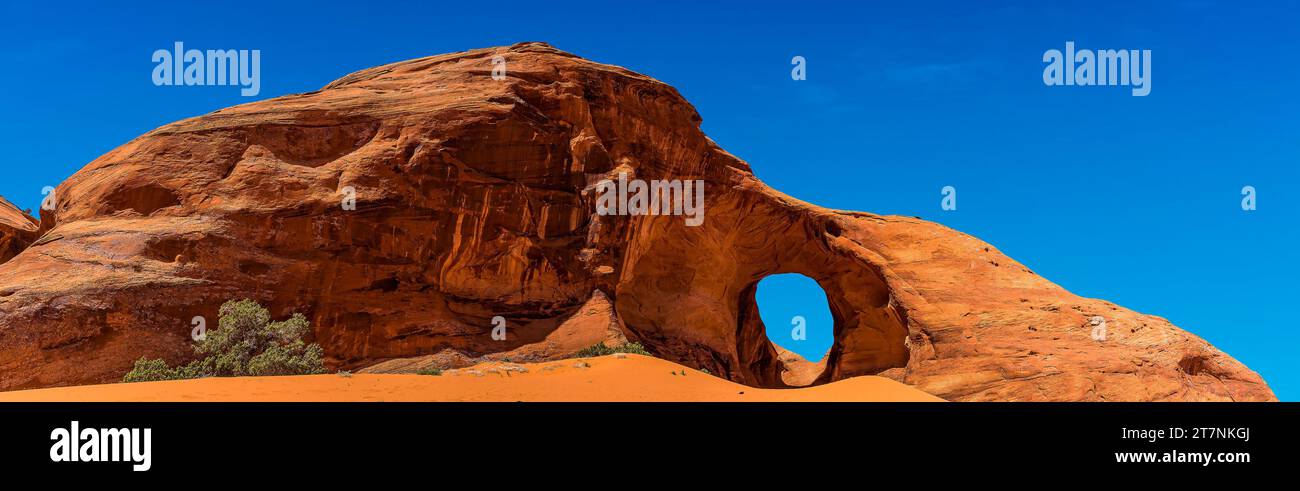 The Ear of the Wind arch in Monument Valley tribal park in springtime ...