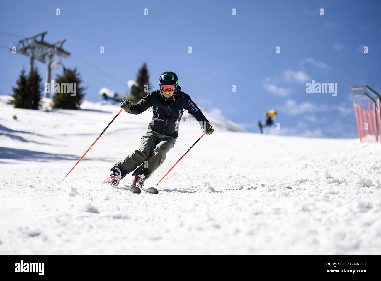 Professional skier skiing on slopes hi-res stock photography and images ...