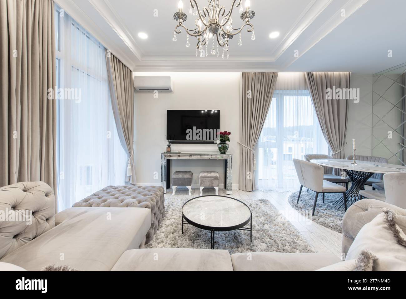 Modern Living Room Interior. Luxury Furniture. TV Screen, Curtains and Sofa. Windows. Coffee ...