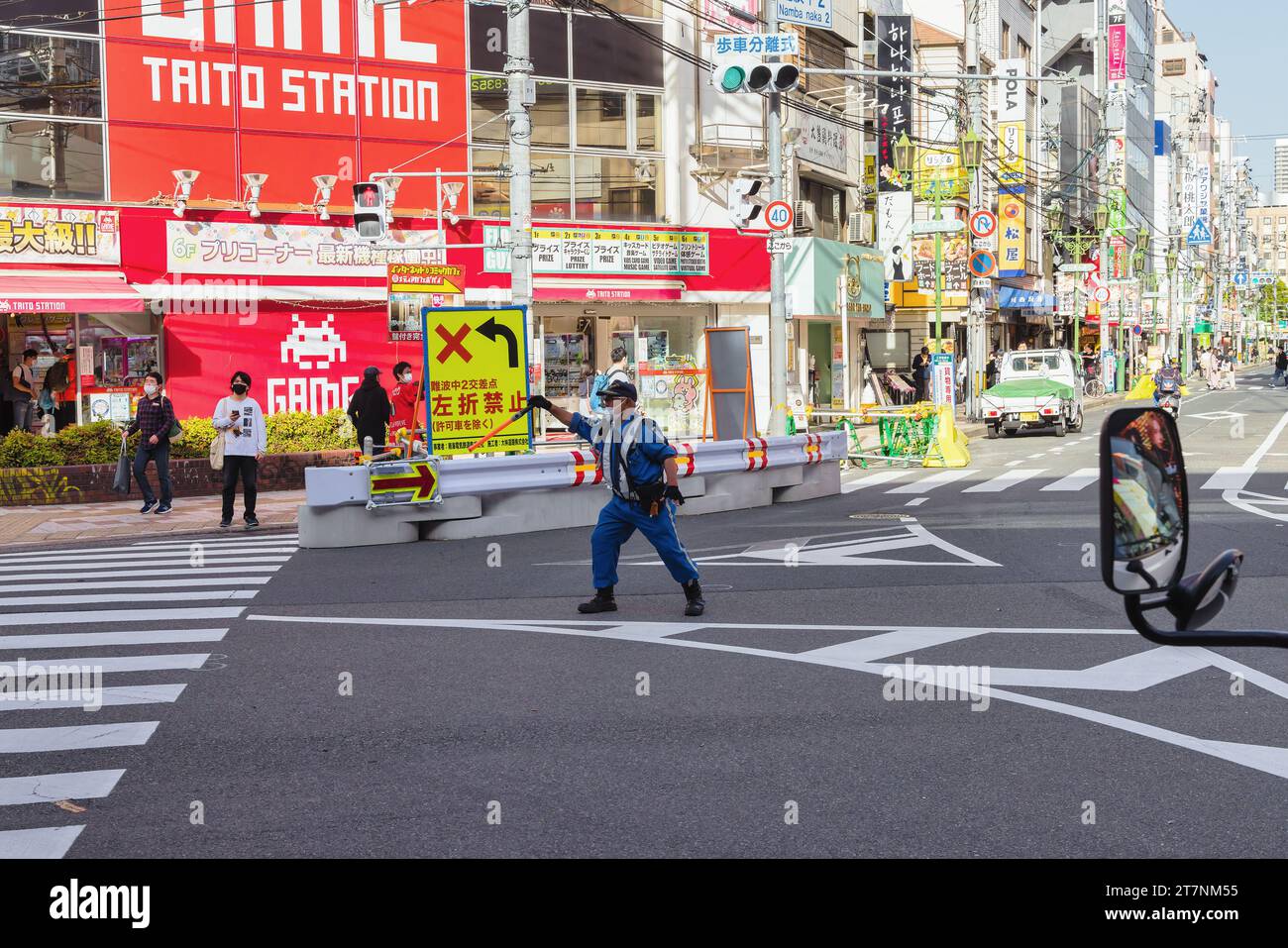 Osaka, Japan - April 13, 2023: street scene with traffic policeman in ...