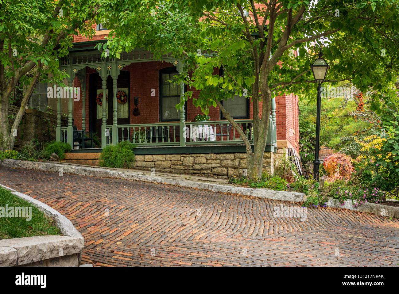 Porch of old home on Snake Alley in Burlington Iowa which has the world ...
