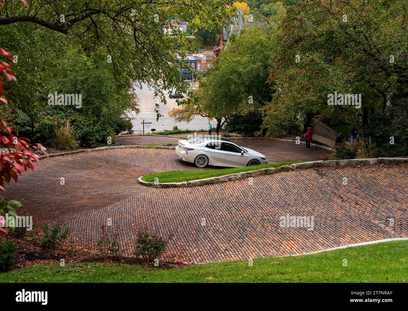 Car driving down Snake Alley in Burlington Iowa which has the world ...