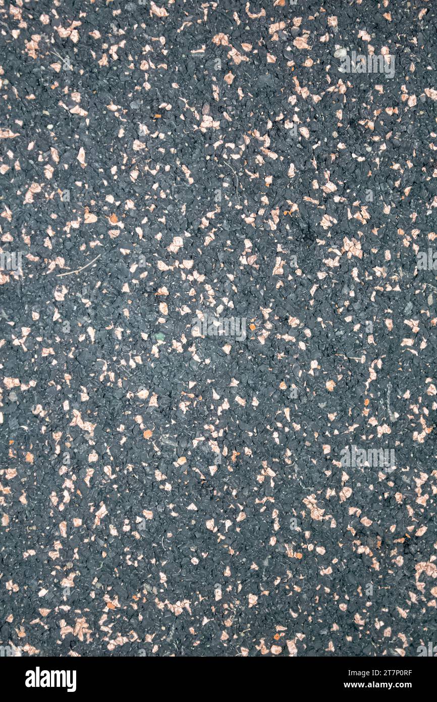 Close up on a white line in artificial red turf, on a street basketball ...