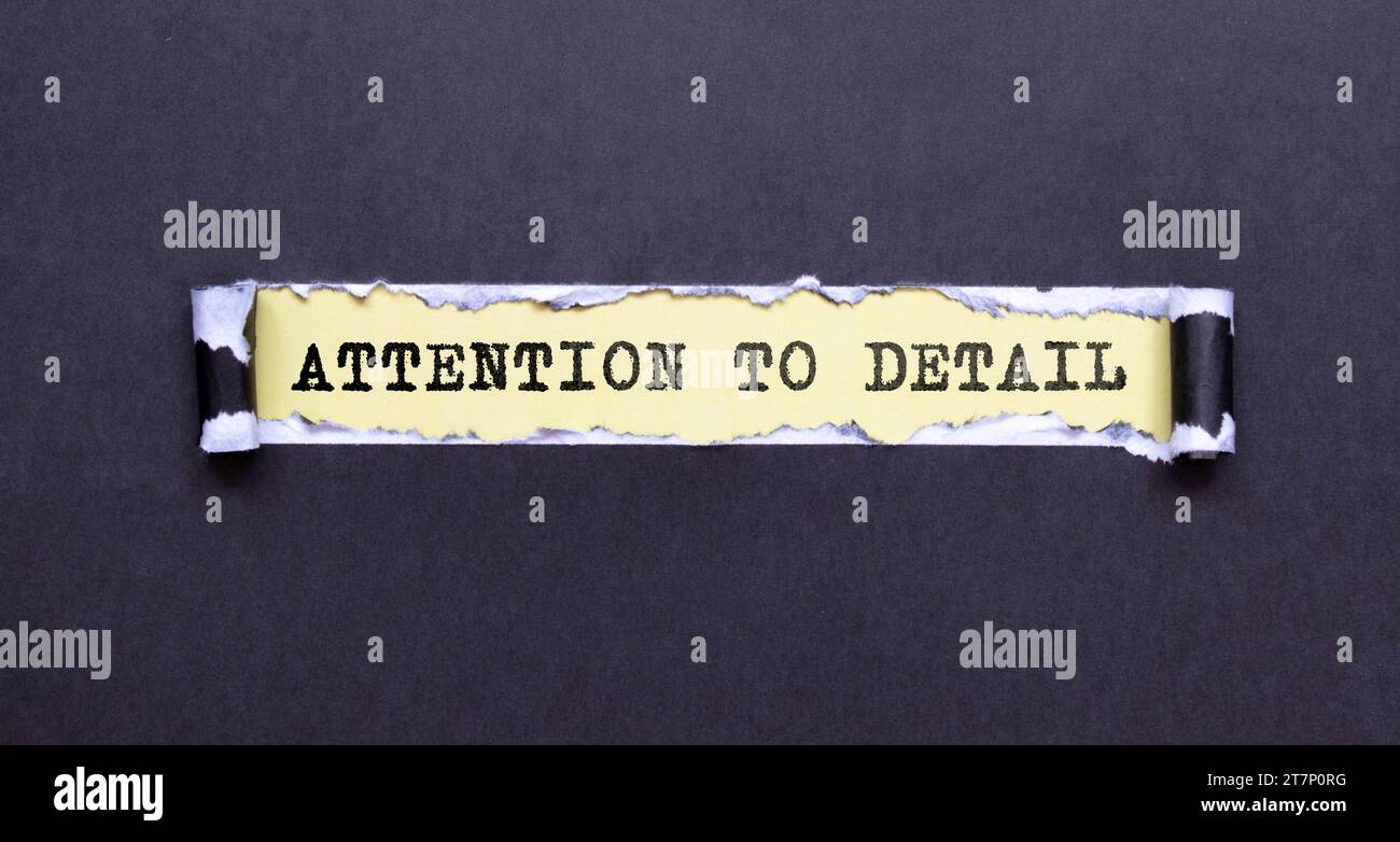 Attention To Detail. text on yellow sticker attached to notepad. gears ...