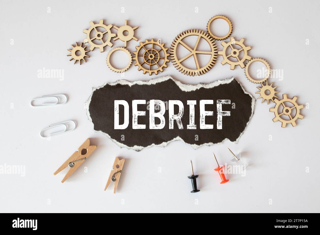 debrief word in a dictionary. debrief concept Stock Photo - Alamy