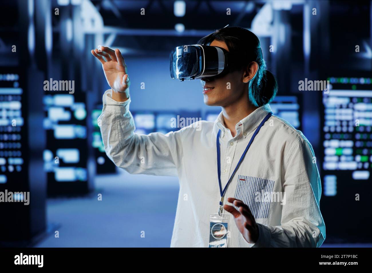 Admin in data center uses virtual reality to prevent system overload during peak traffic periods ...