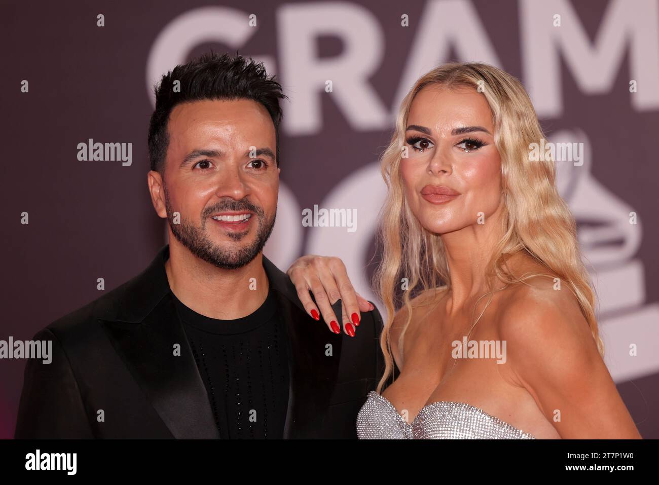 Luis Fonsi, left, and Agueda Lopez arrive at the 24th annual Latin ...