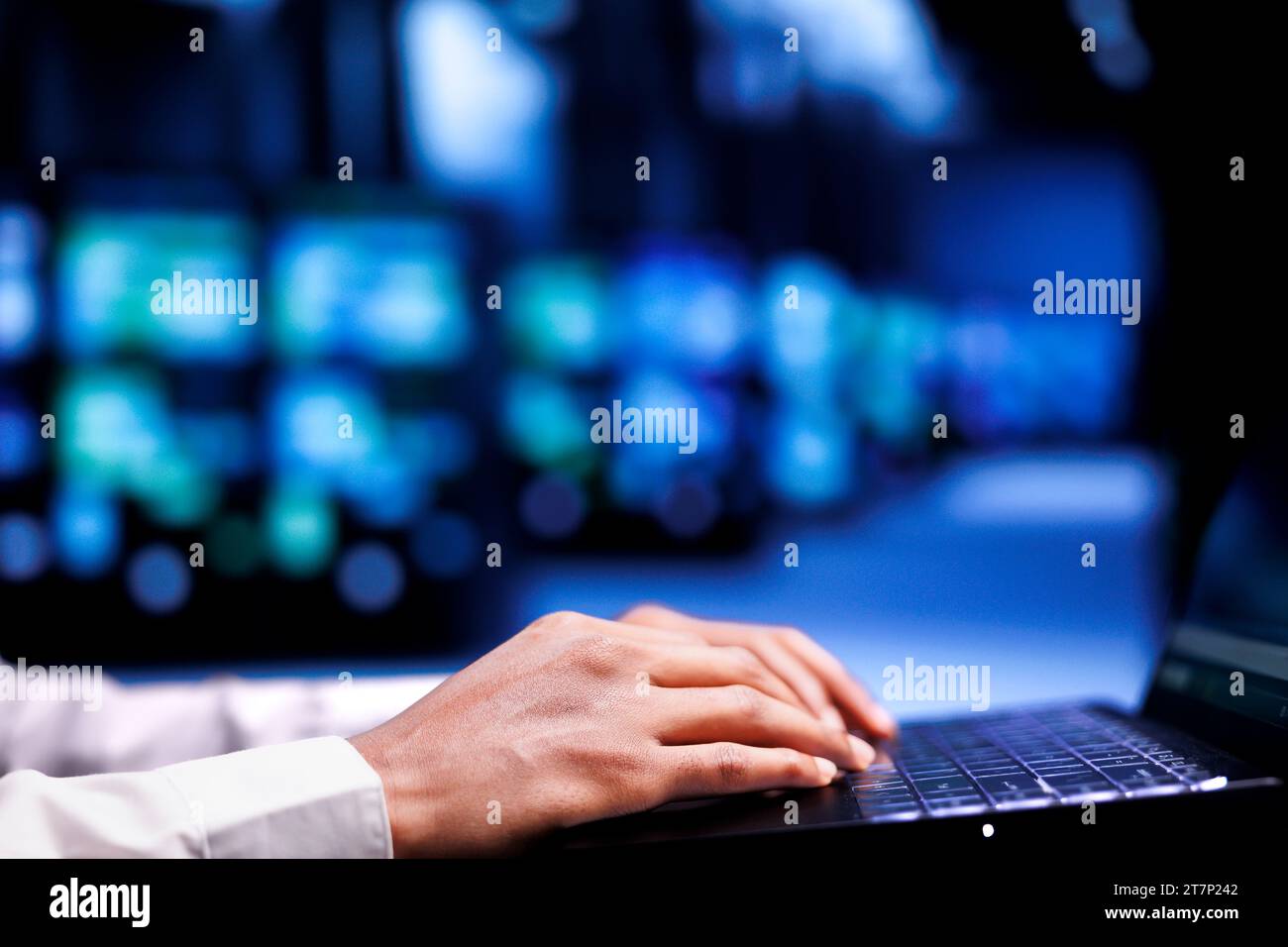 Close up shot of admin in cloud computing business using laptop to set ...