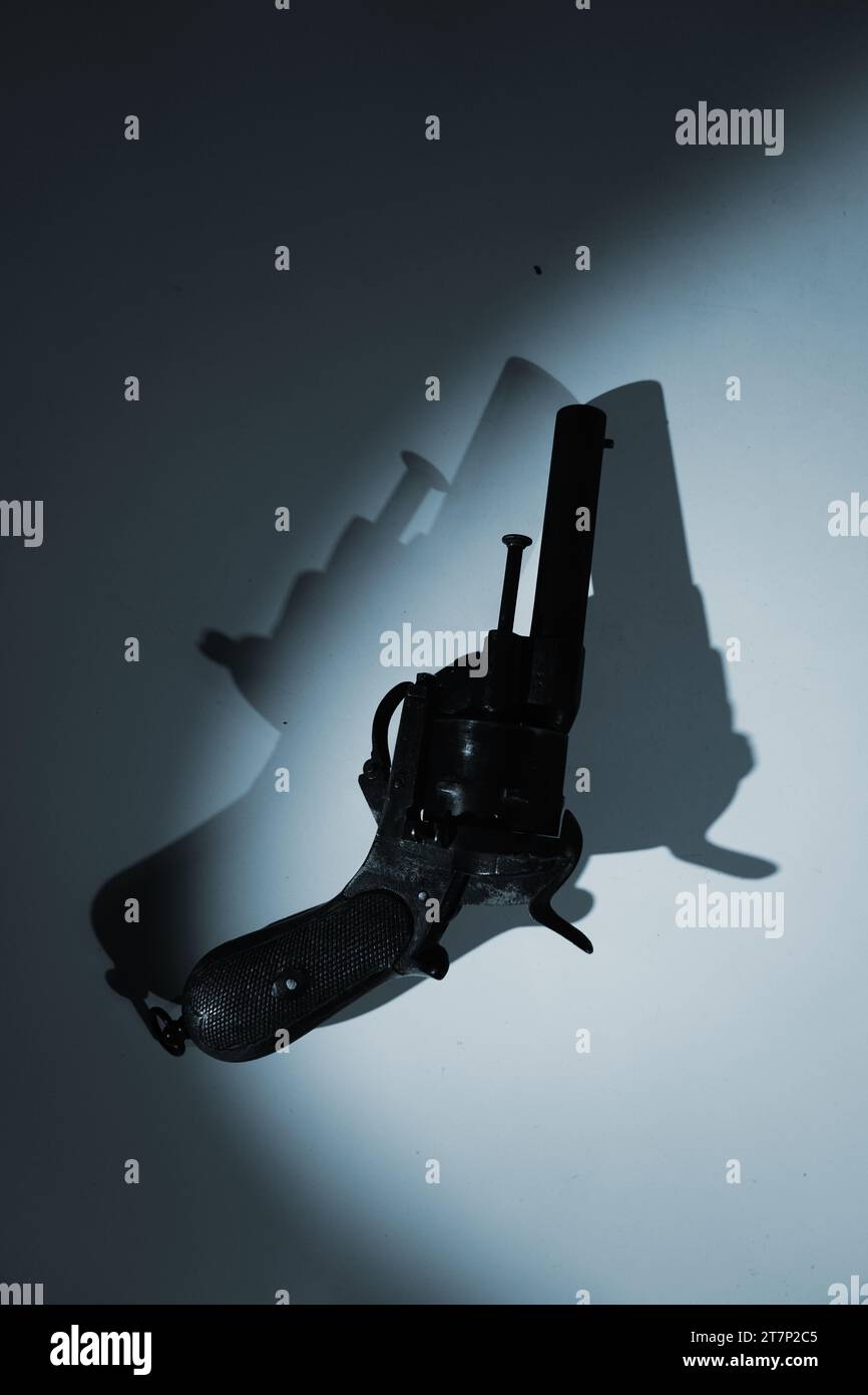 Pistol gun artistic photograph book cover design Stock Photo - Alamy