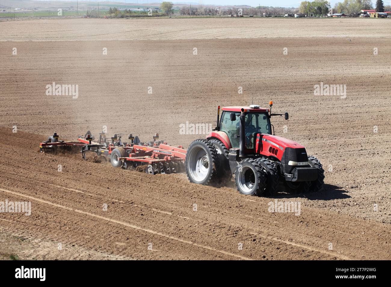 Farmer in tractor soil plows hi-res stock photography and images - Alamy