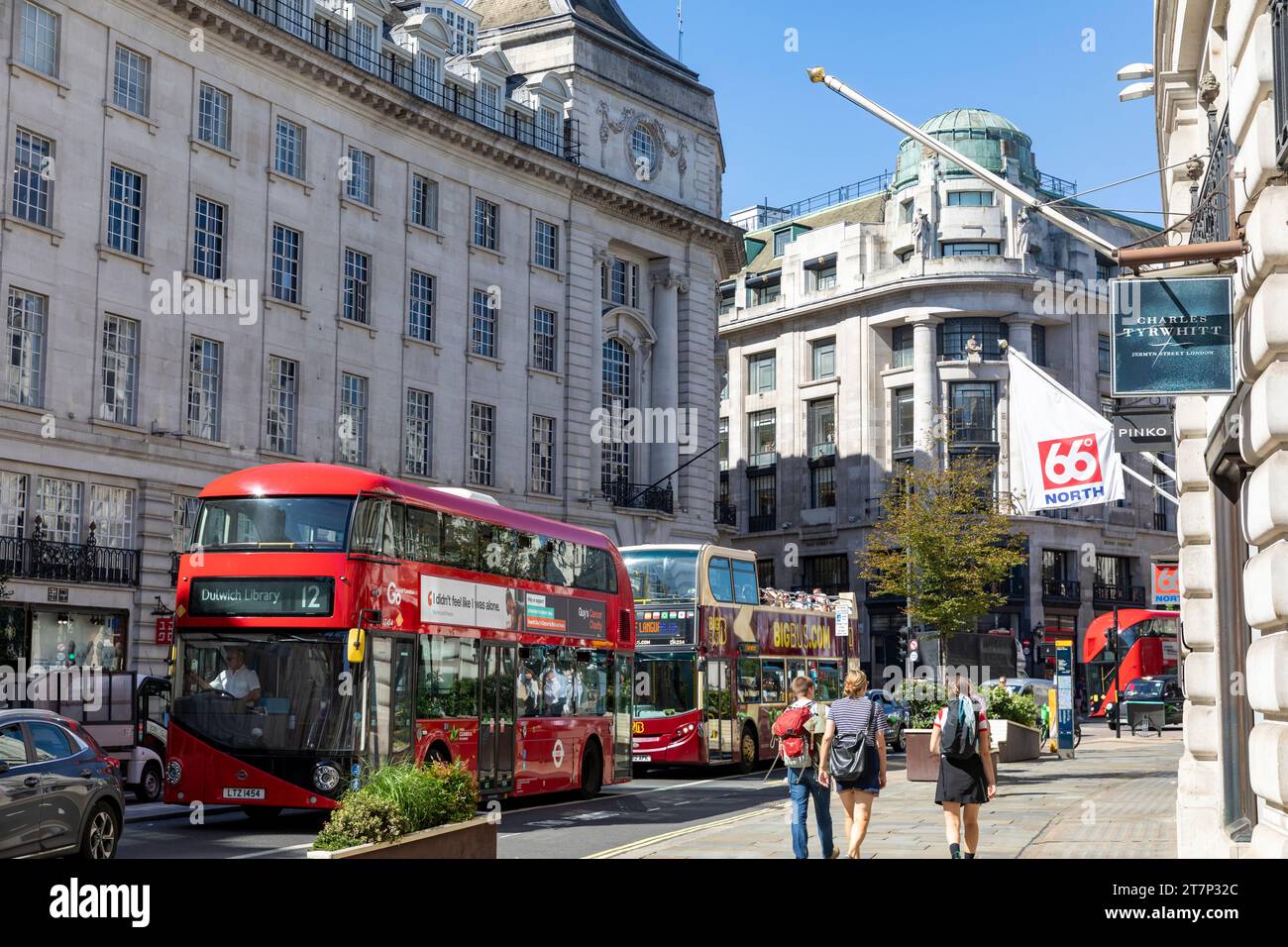 Regent street London, double decker red bus and sightseeing tour bus, shoppers walk past 66 ...
