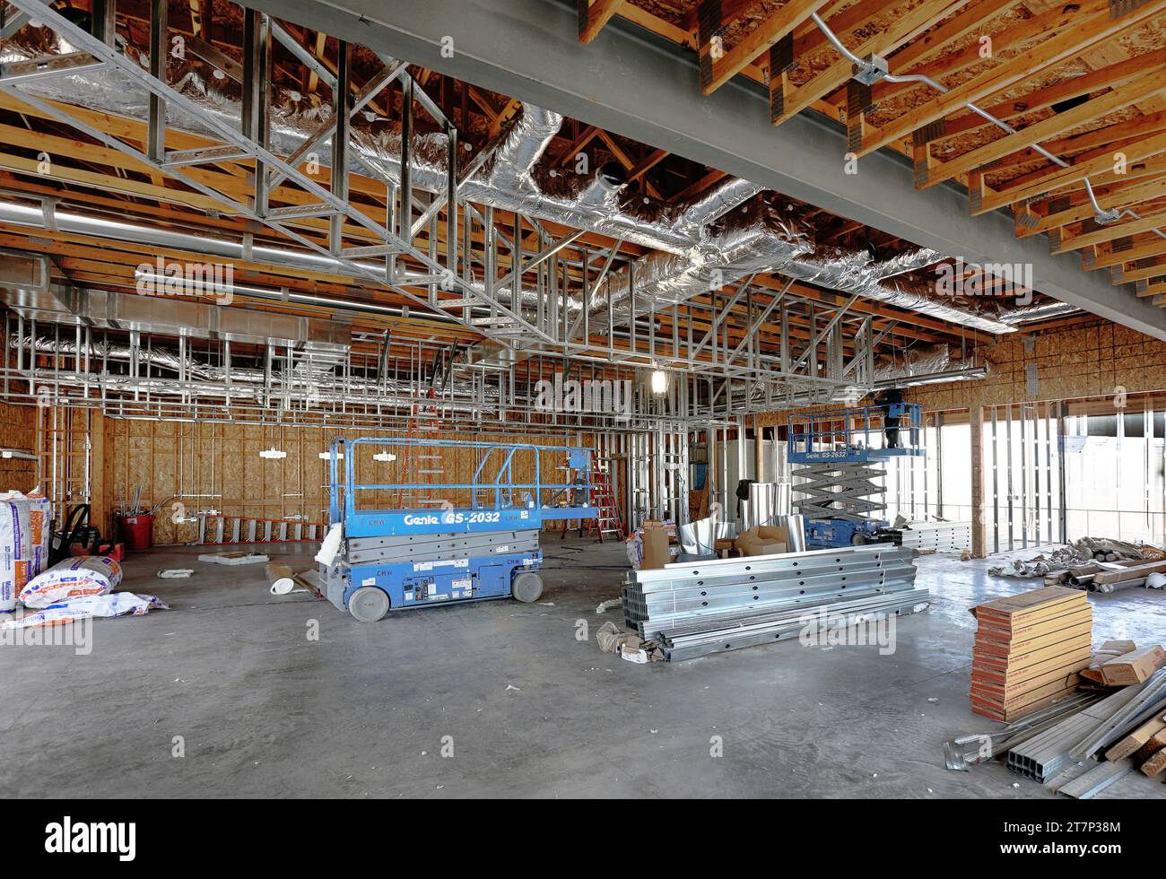 Steel duct work being installed in a new office building Stock Photo ...