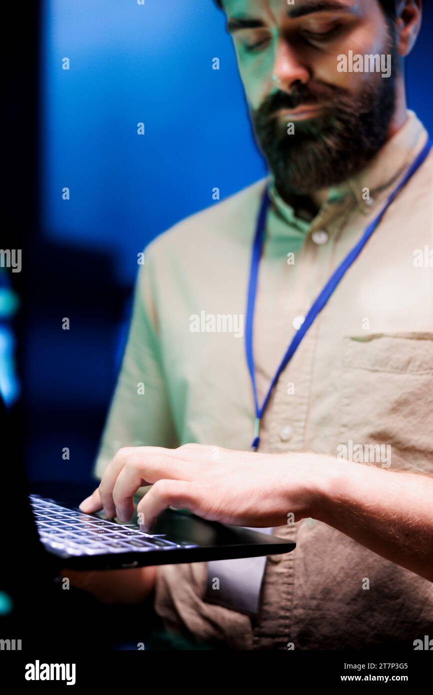 Engineer Maintenancing Server Rigs To Optimize Them For Data Processing Requirements Of Ai